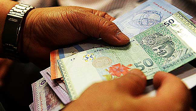 Ringgit dips to weakest level since 1998 Asian financial crisis | Free ...