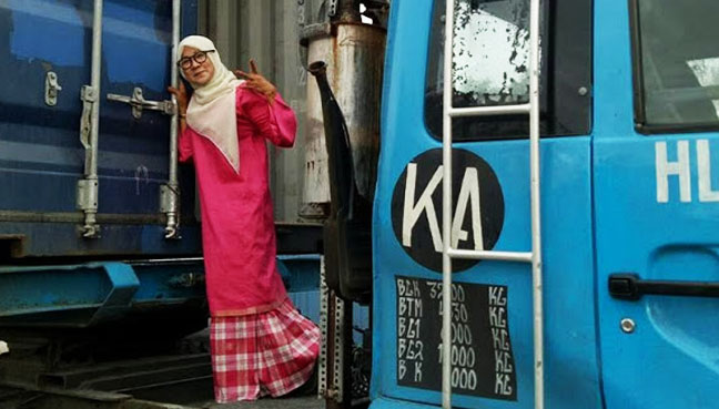 51-year-old ‘Kak Lori’ powers through a man’s world | Free Malaysia ...