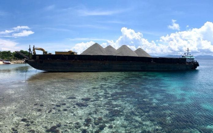 Barge damages reef at famous dive site but there’s little Sabah can do ...