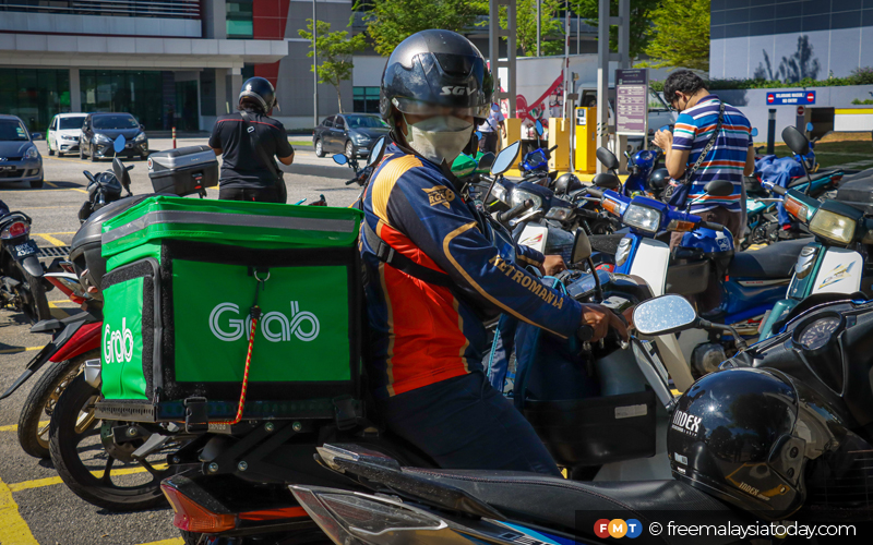 Grab faces crossroads in food delivery as restaurant dining returns ...