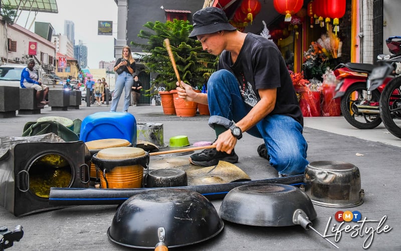 Busker Tai Chun Wai drums to the beat of the street | Free Malaysia ...